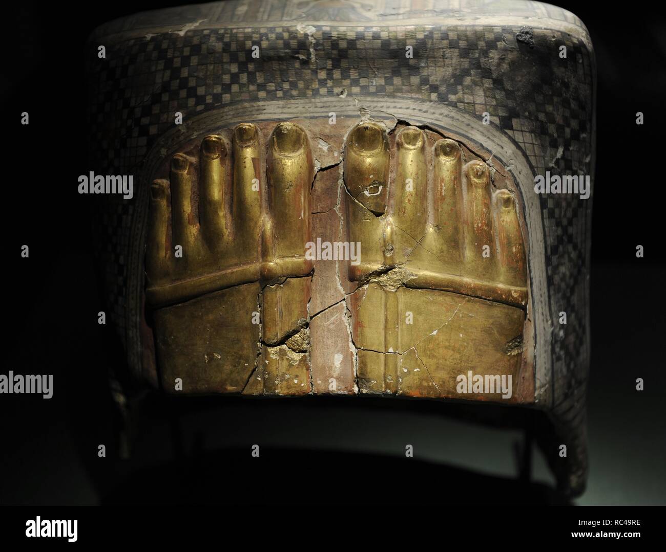 Foot case for a mummy. Gilded feet with sandals and a checker pattern ...