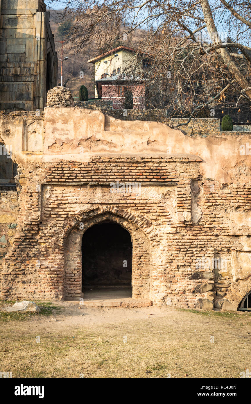 A small arch gate into an abandoned fort in Srinagar, Kashmir ...