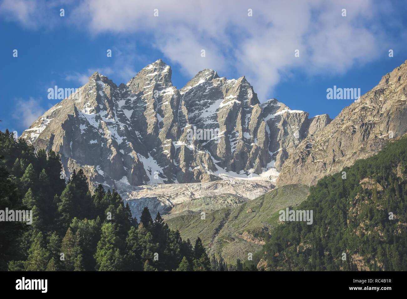 A snow-capped mountain peak. A mountain with a glacier in the Himalayas ...