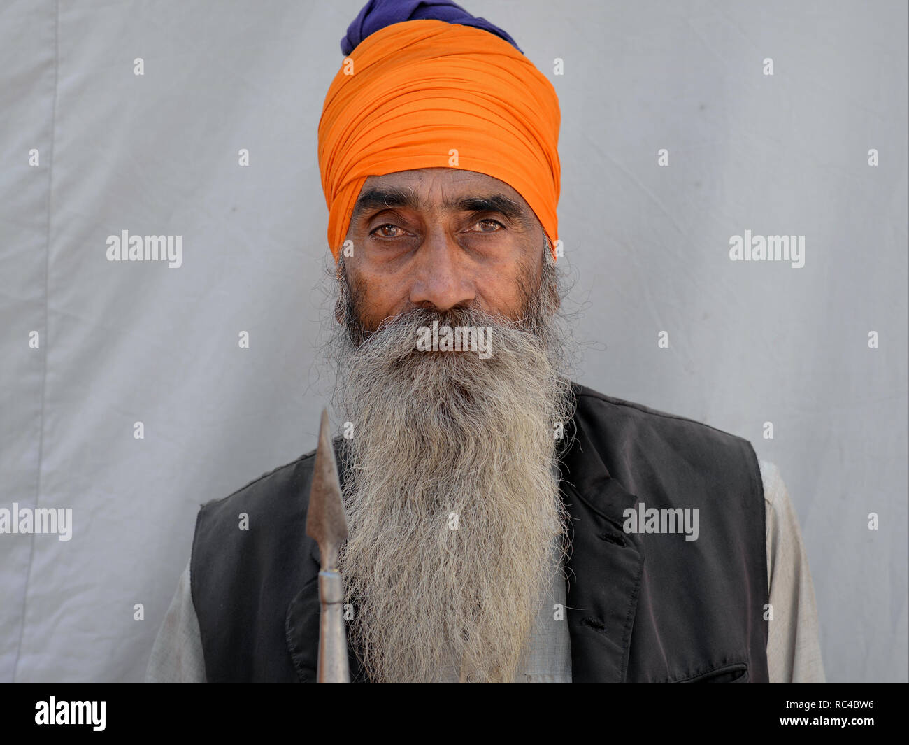 Sikh temple orange turban hi-res stock photography and images - Alamy
