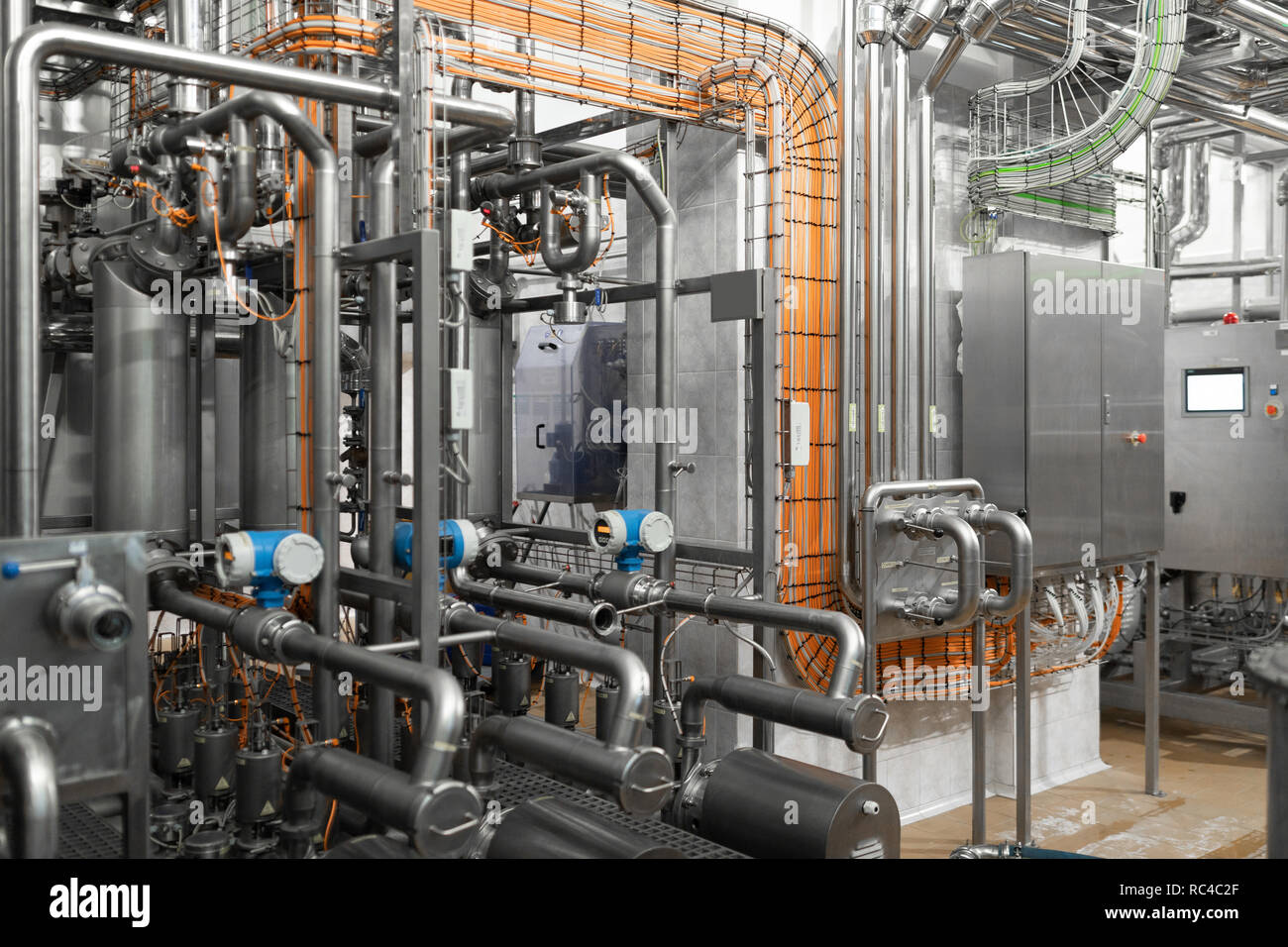 Cheese-making equipment of cheese factory background Stock Photo - Alamy