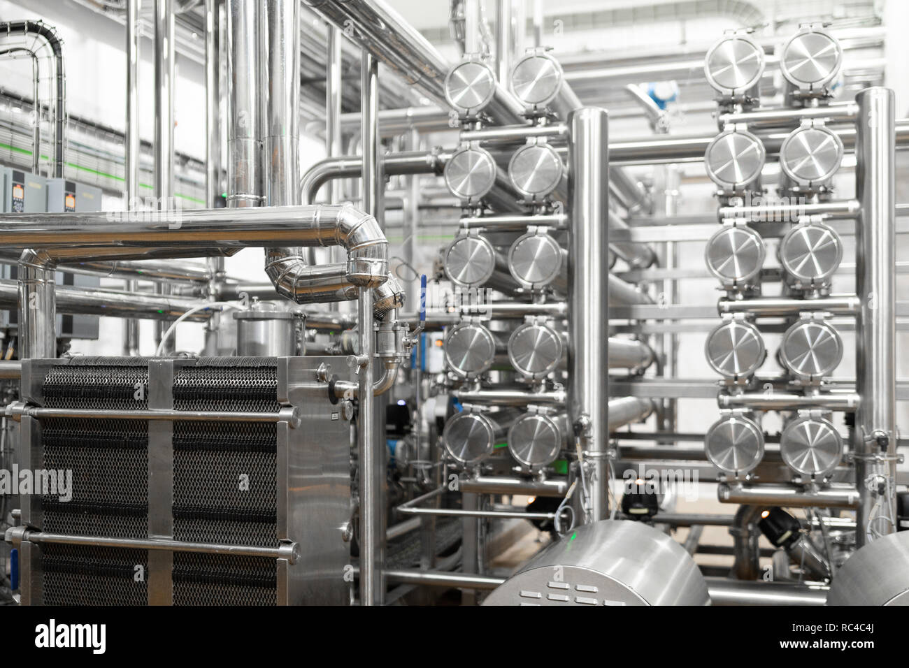 Cheese-making equipment of cheese factory background Stock Photo - Alamy