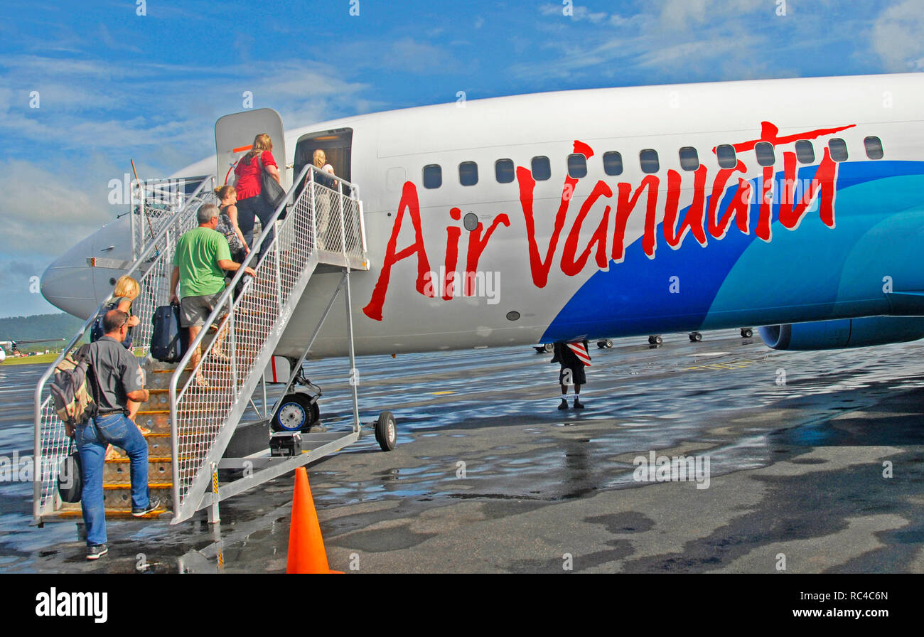 passengers boarding a 737 Boeing of Vanuatu airlines, Port Vila international airport, Efate ...