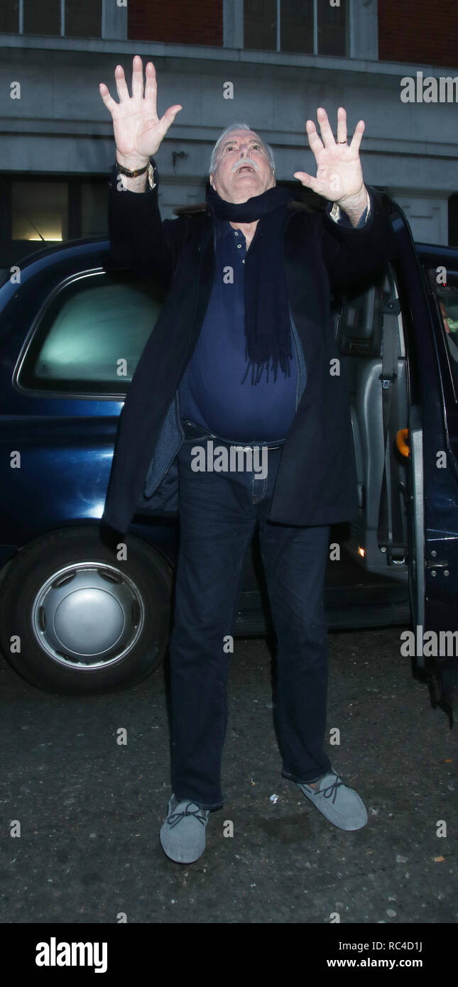 John cleese arriving wogan house hi-res stock photography and images ...