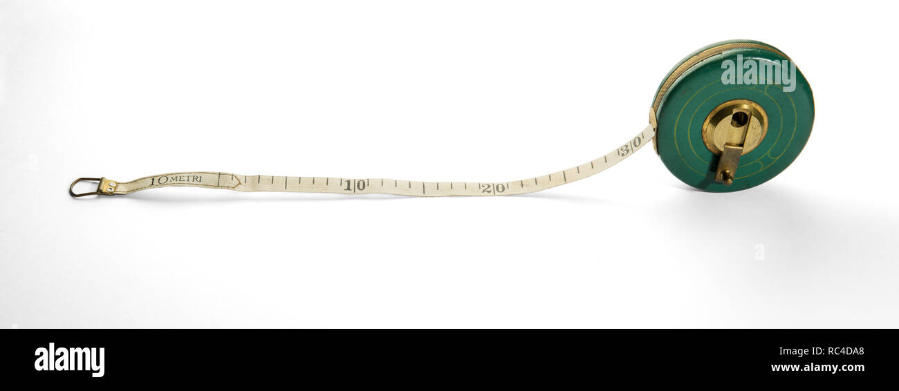 Vintage 10 meter measuring tape unrolled horizontally on white ...