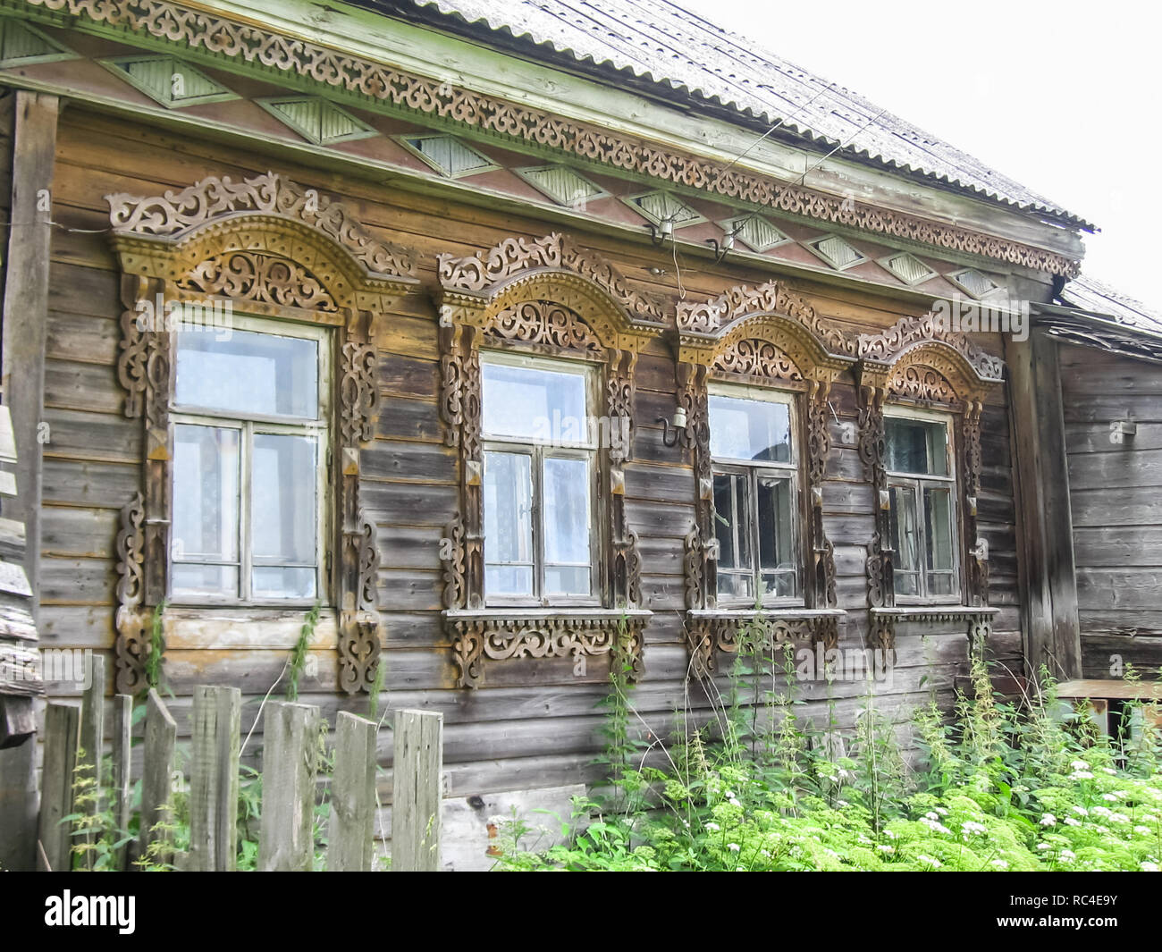 Plinths of windows of wooden houses. Ancient style of decoration of ...