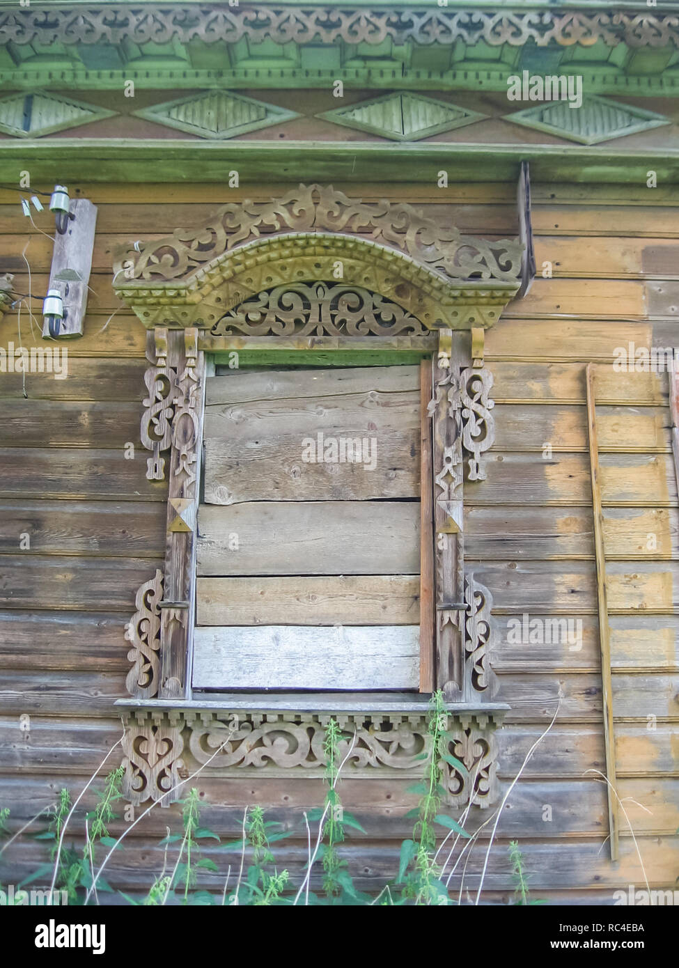 Plinths of windows of wooden houses. Ancient style of decoration of ...