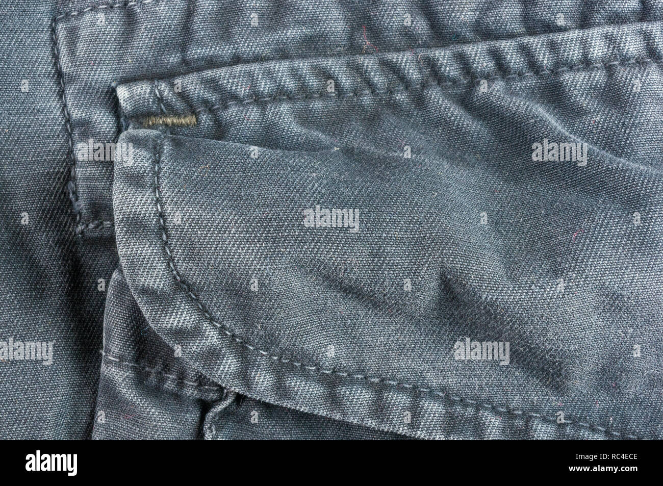 clothing items washed cotton fabric texture with seams, macro, close-up ...