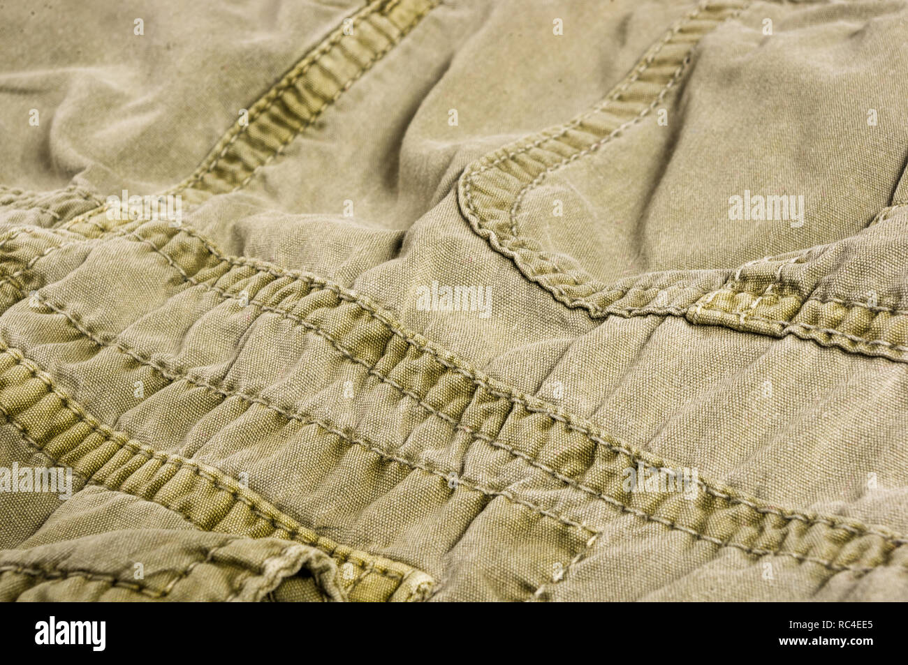 clothing items washed cotton fabric texture with seams, macro, close-up ...