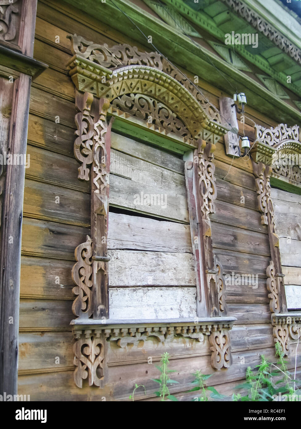 Plinths of windows of wooden houses. Ancient style of decoration of ...