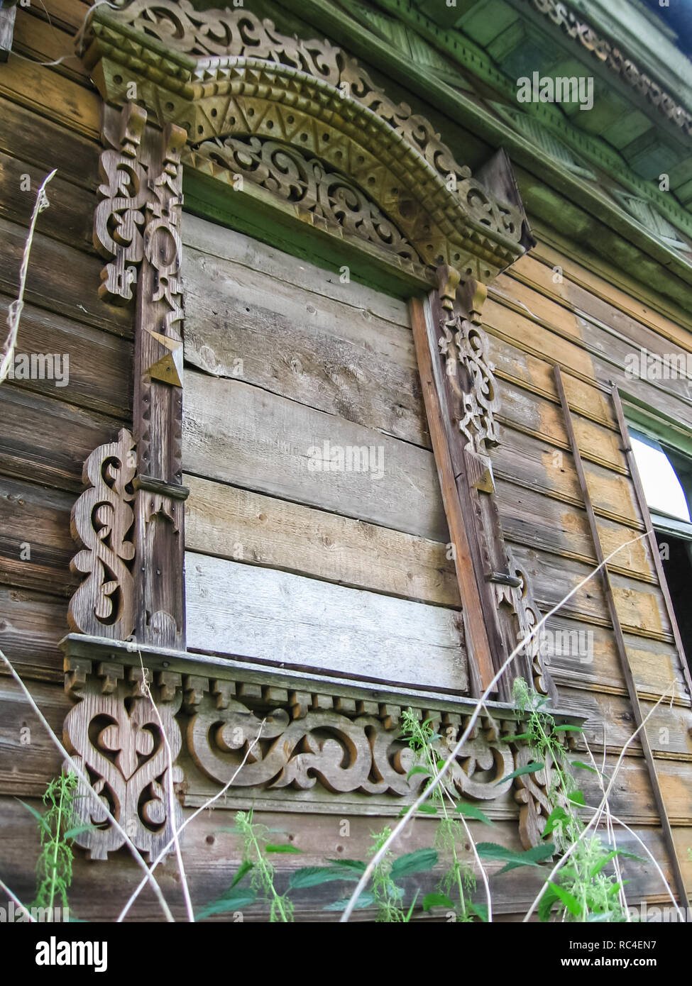 Plinths of windows of wooden houses. Ancient style of decoration of ...