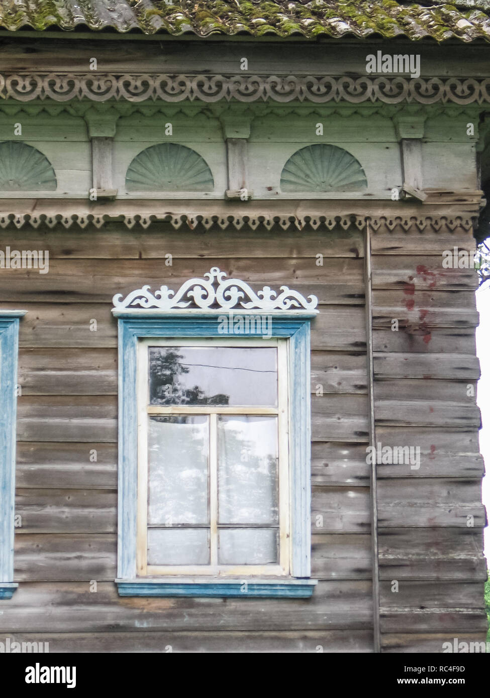 Plinths of windows of wooden houses. Ancient style of decoration of ...
