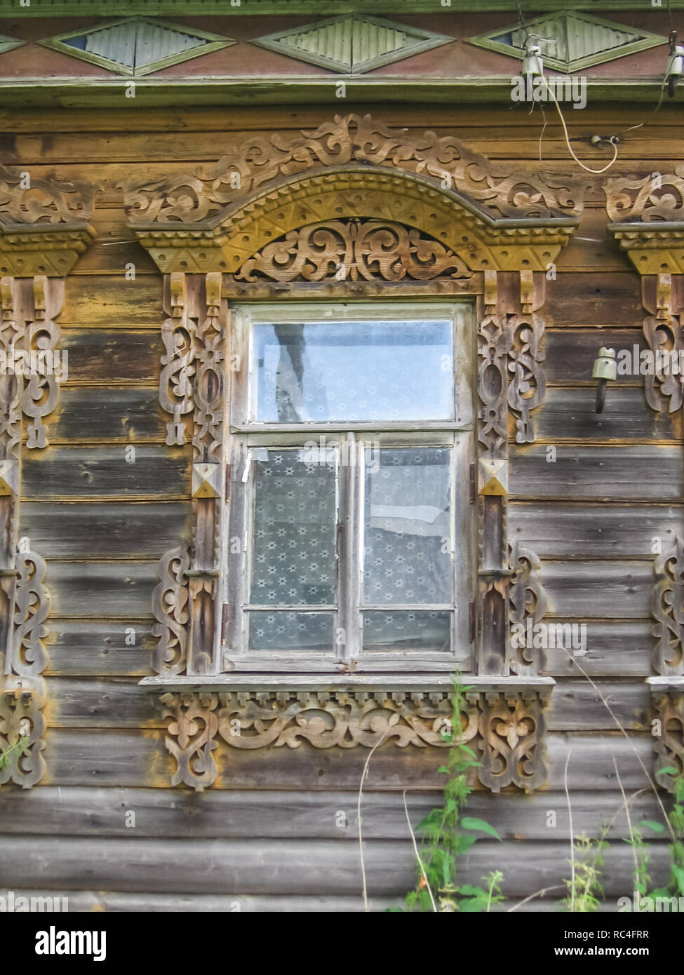 Plinths of windows of wooden houses. Ancient style of decoration of ...