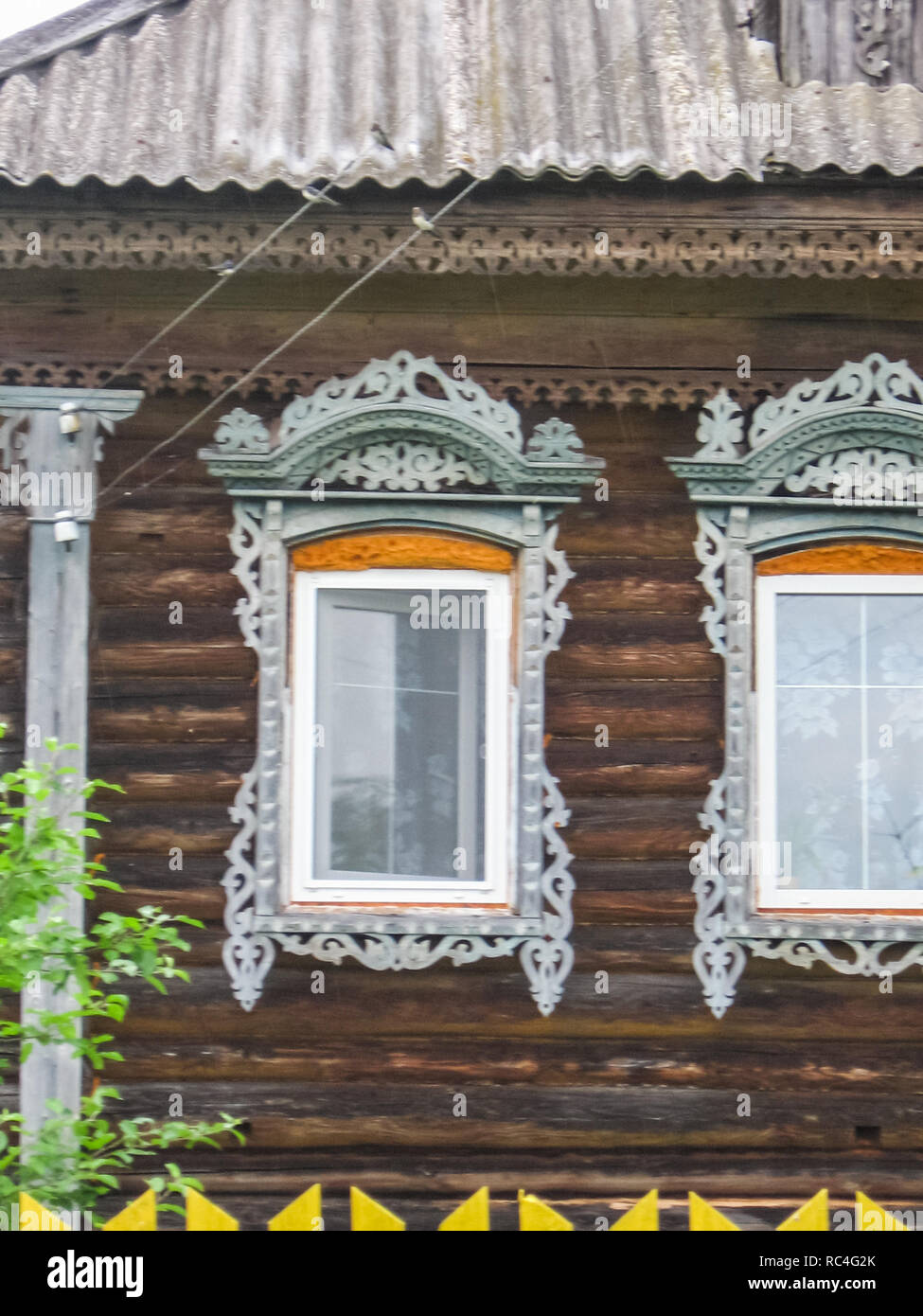 Plinths of windows of wooden houses. Ancient style of decoration of ...