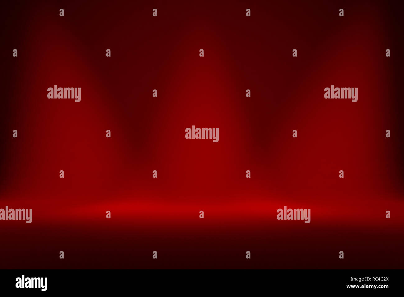 Red colored infinite studio background with spot lights Stock Photo - Alamy