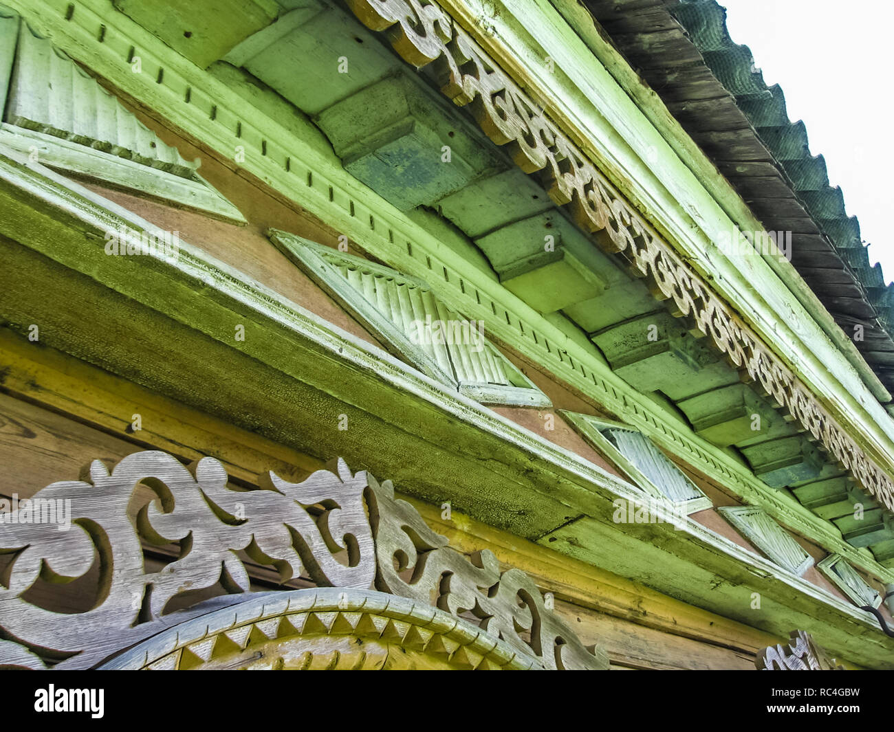 Plinths of windows of wooden houses. Ancient style of decoration of ...