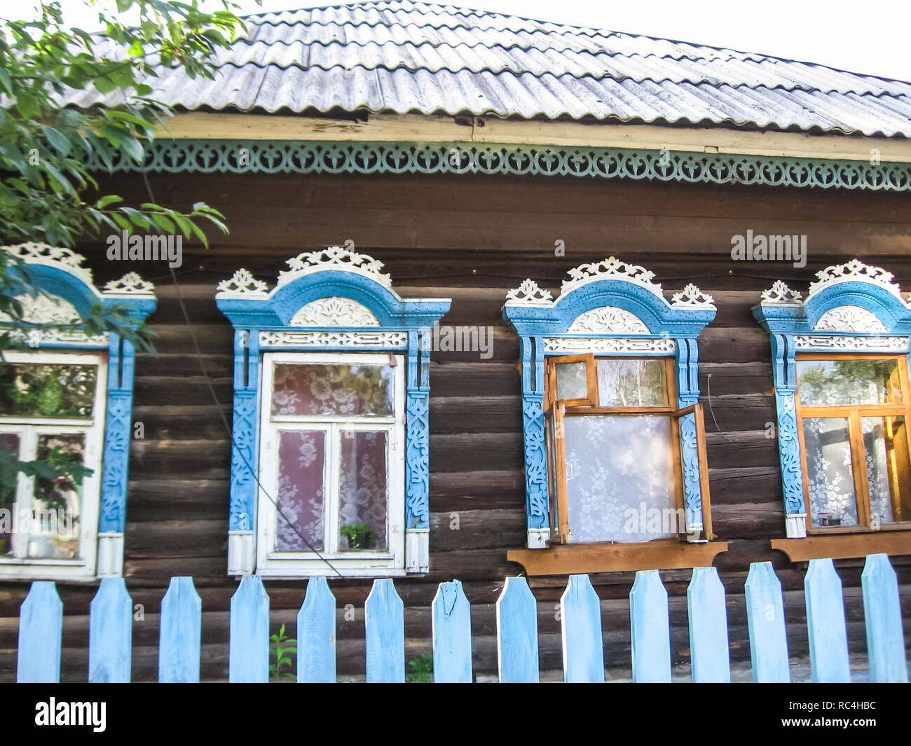 Plinths of windows of wooden houses. Ancient style of decoration of ...