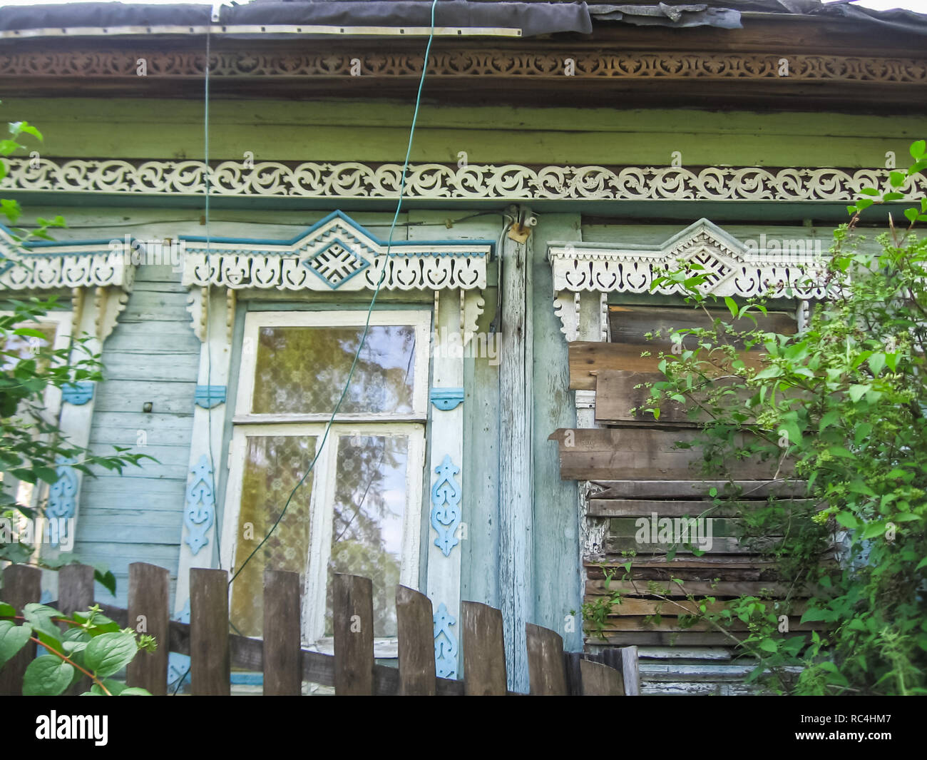 Plinths of windows of wooden houses. Ancient style of decoration of ...