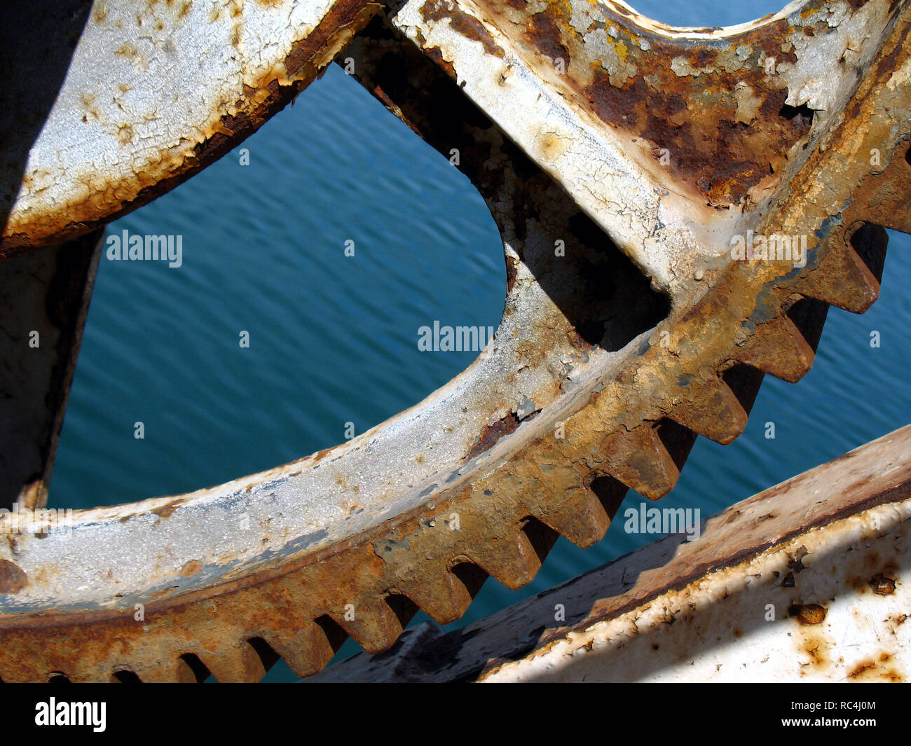 Rust on the cogwheel of an old crane Stock Photo - Alamy