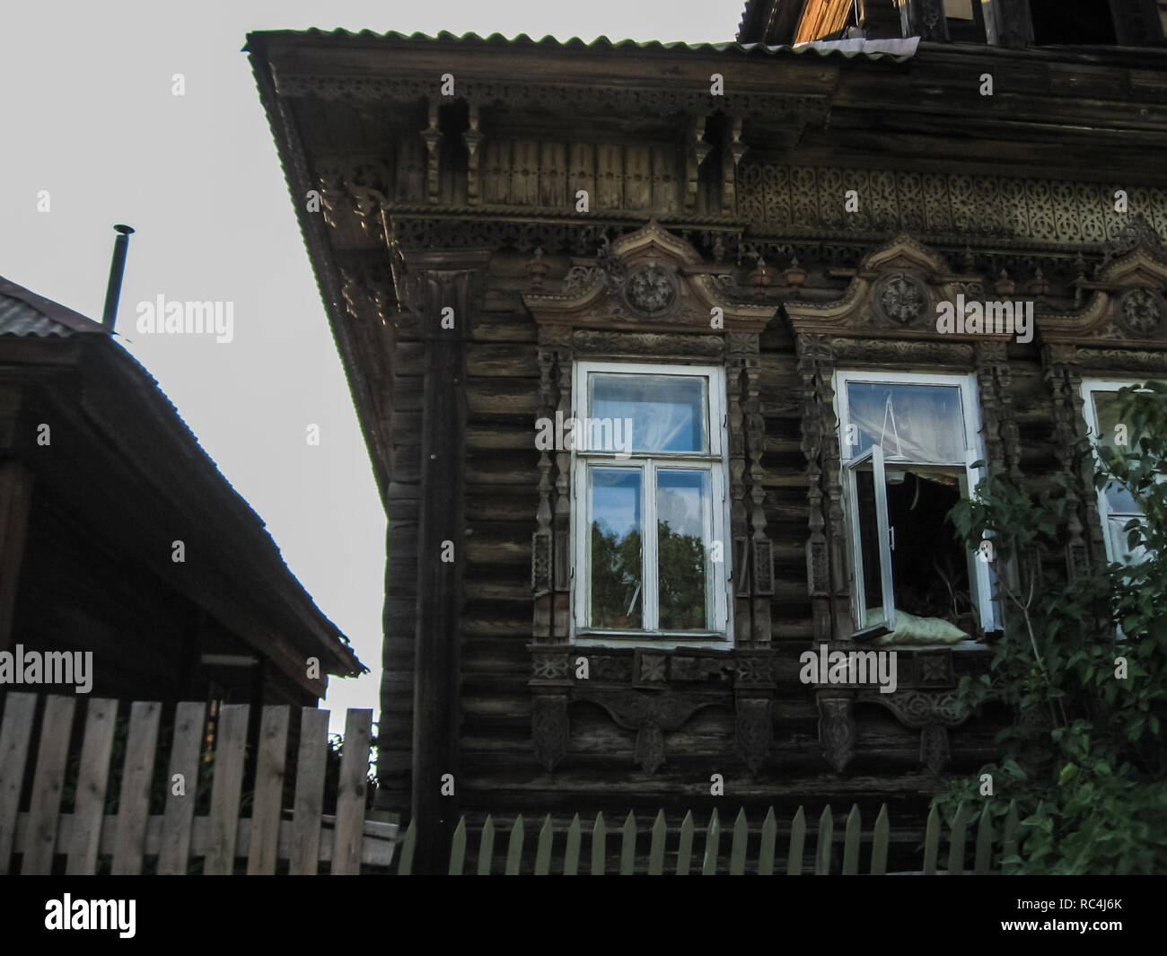 Plinths of windows of wooden houses. Ancient style of decoration of ...