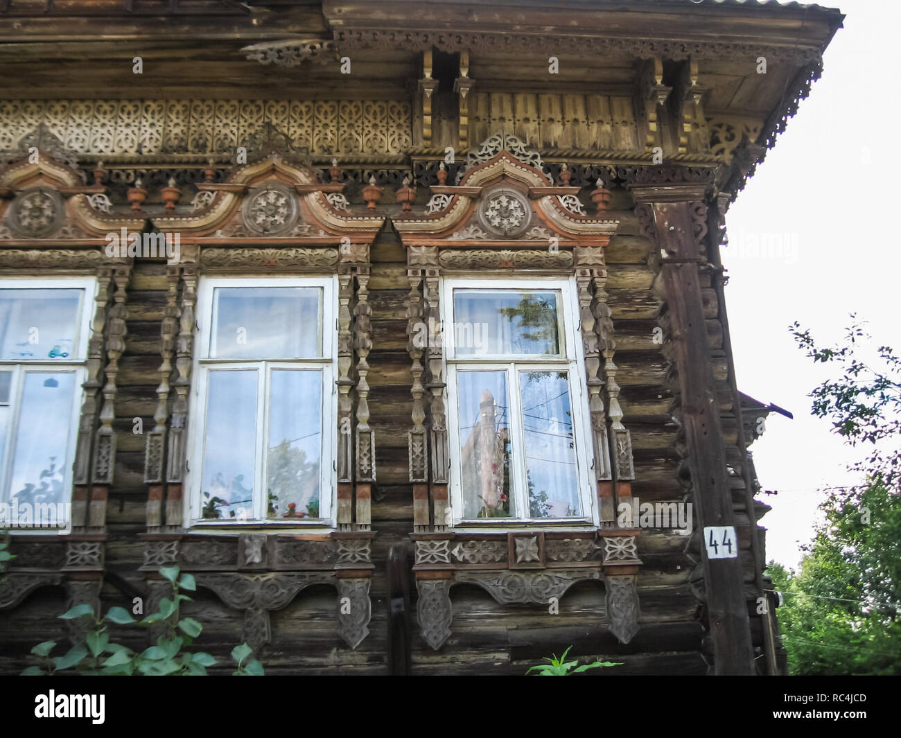Plinths of windows of wooden houses. Ancient style of decoration of ...