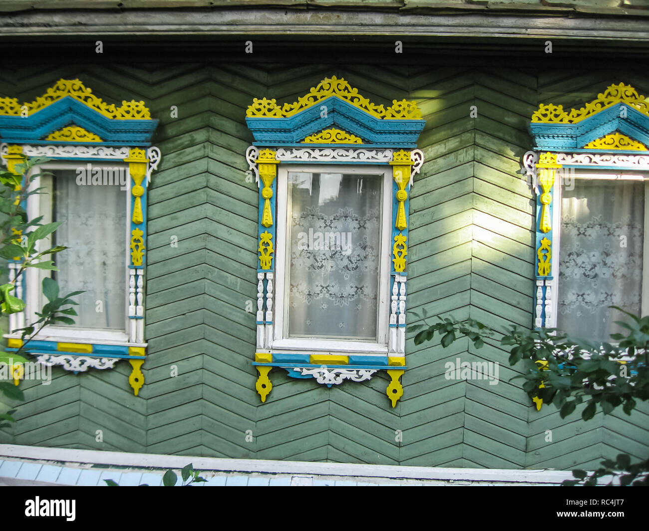 Plinths of windows of wooden houses. Ancient style of decoration of ...