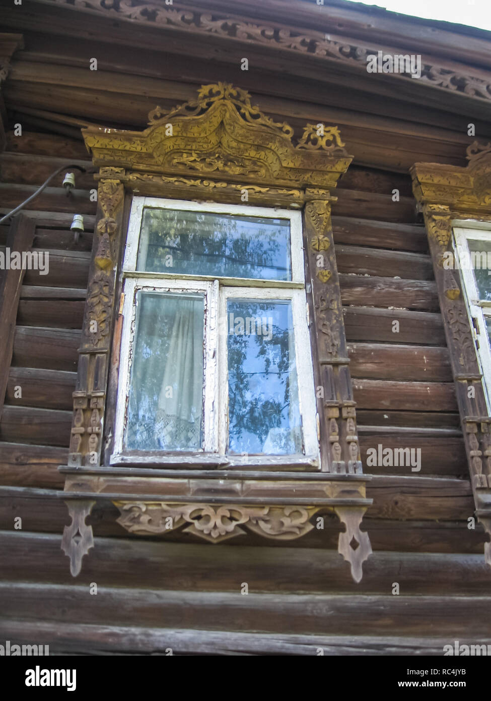 Plinths of windows of wooden houses. Ancient style of decoration of ...