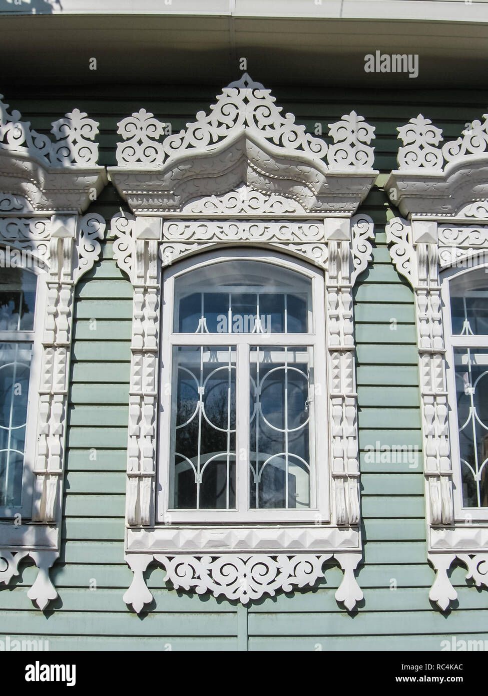 Plinths of windows of wooden houses. Ancient style of decoration of ...