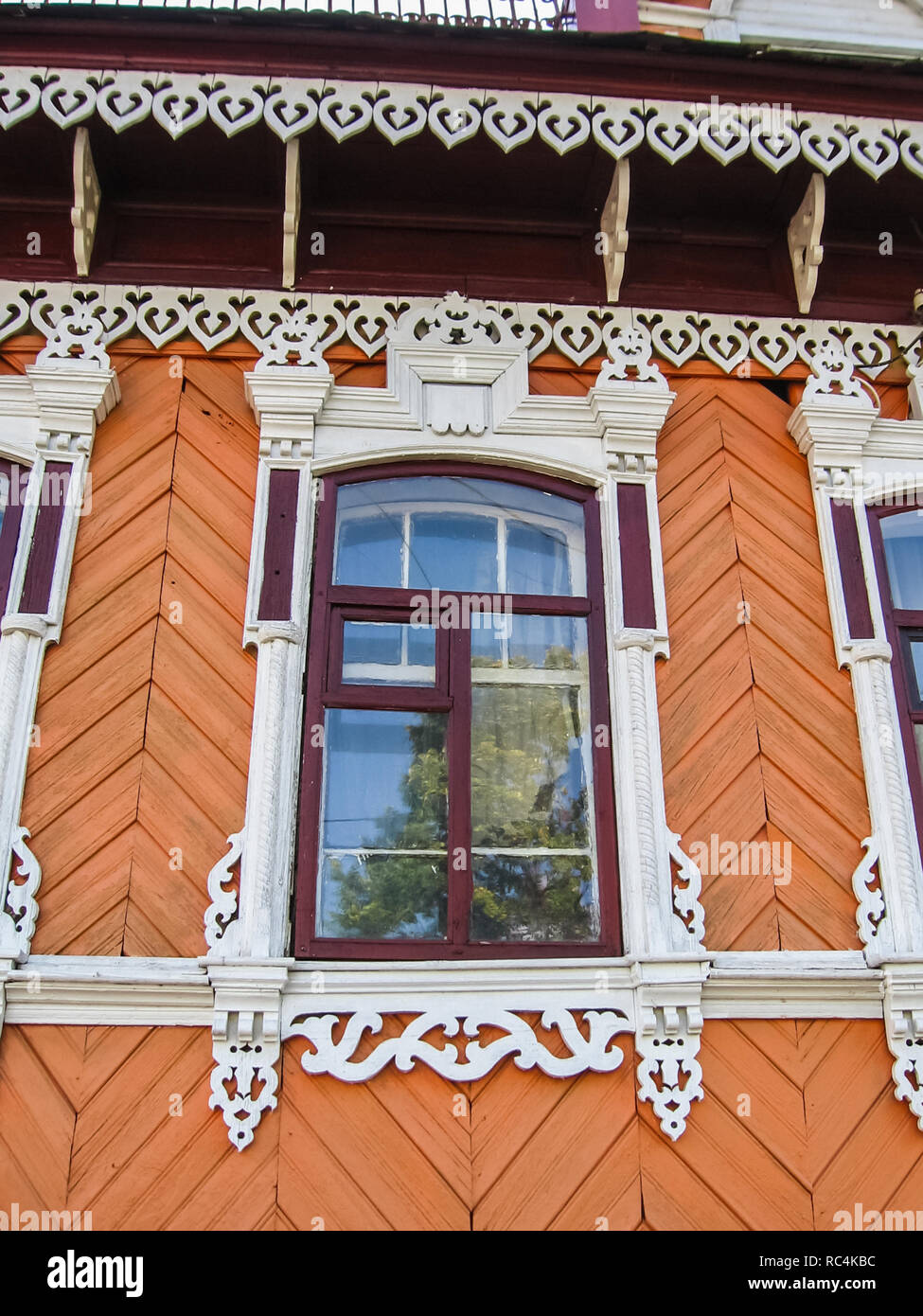 Plinths of windows of wooden houses. Ancient style of decoration of ...