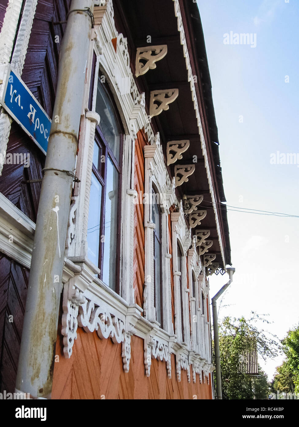 Plinths of windows of wooden houses. Ancient style of decoration of ...