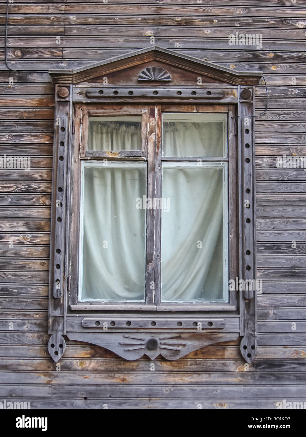 Plinths of windows of wooden houses. Ancient style of decoration of ...