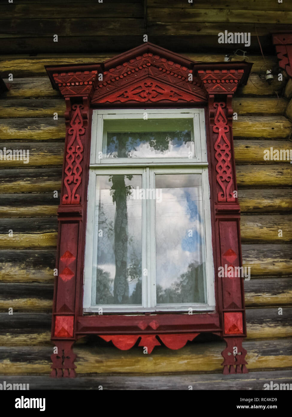 Plinths of windows of wooden houses. Ancient style of decoration of ...