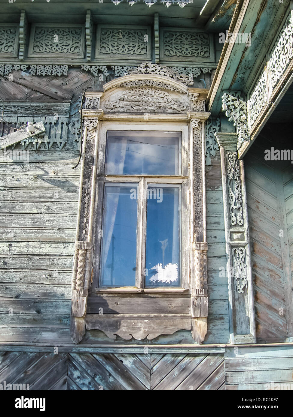Plinths of windows of wooden houses. Ancient style of decoration of ...