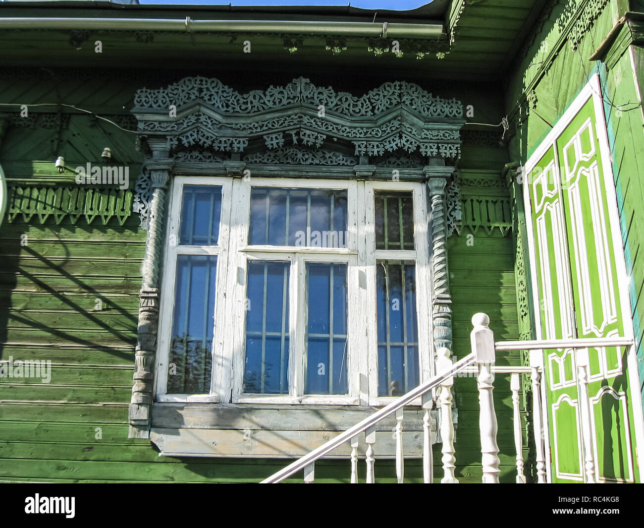 Plinths of windows of wooden houses. Ancient style of decoration of ...