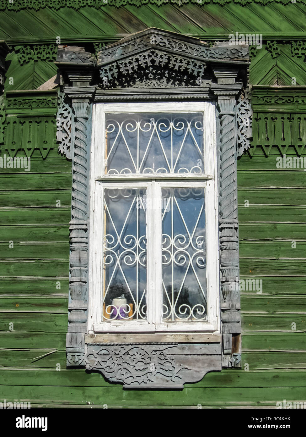 Plinths of windows of wooden houses. Ancient style of decoration of ...