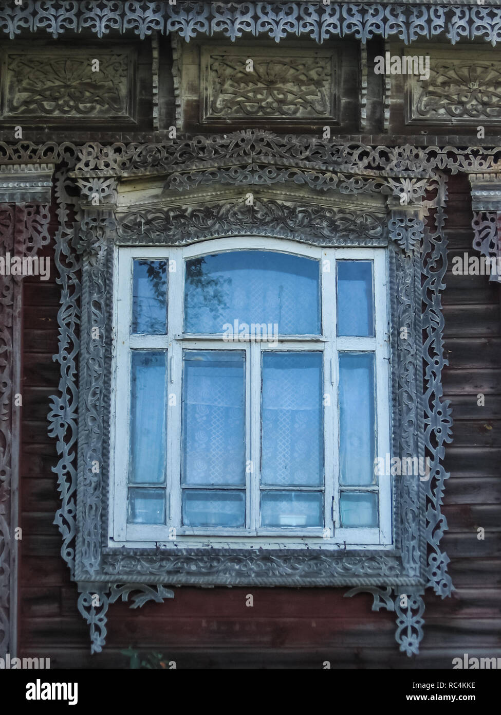Plinths of windows of wooden houses. Ancient style of decoration of ...