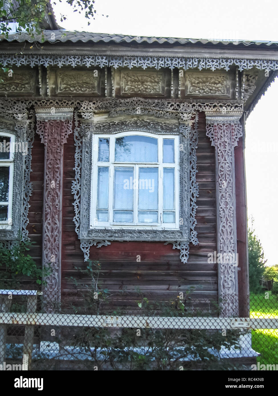 Plinths of windows of wooden houses. Ancient style of decoration of ...