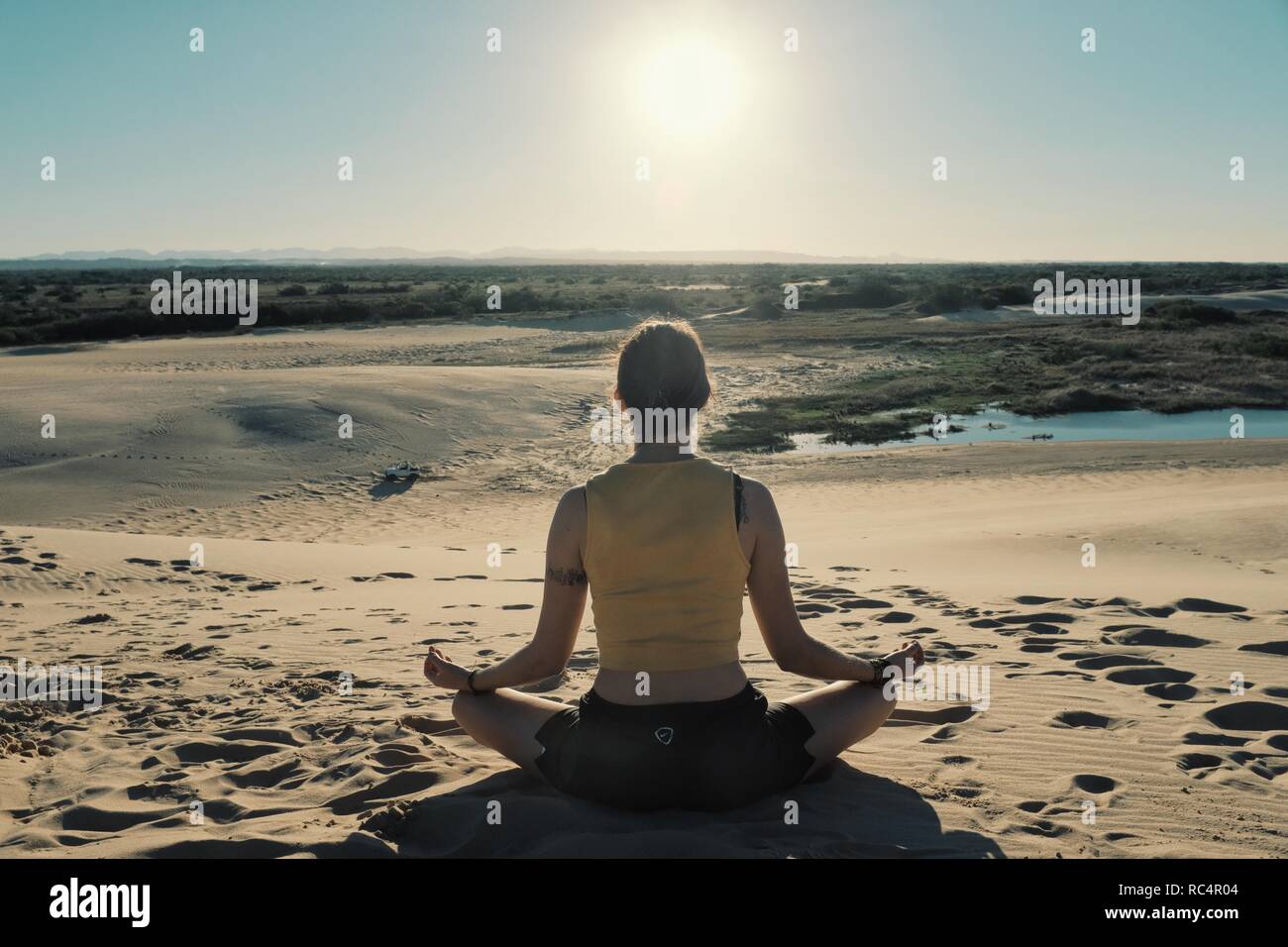 Woman sunbathing on top car hi-res stock photography and images - Alamy