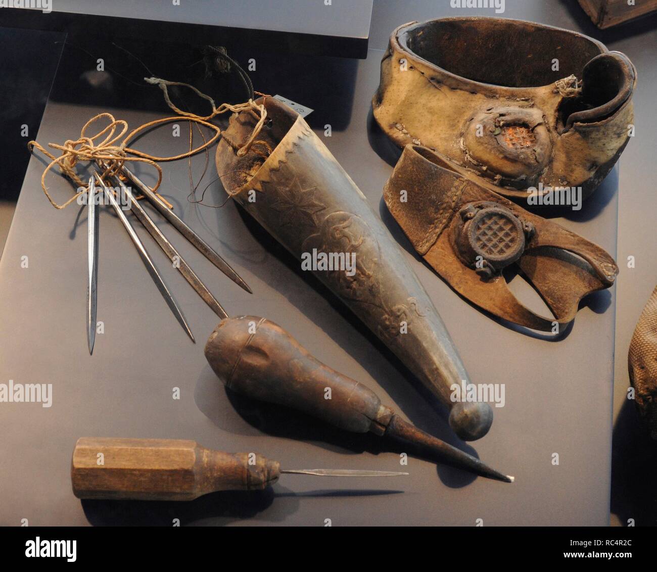 Work on the sailing ships. Maintenance work. Tools: sailmaker's palm ...