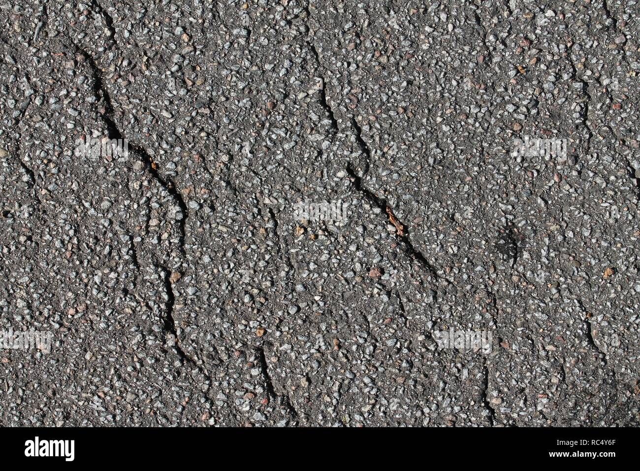 Close up high resolution surface of asphalt with cracks Stock Photo - Alamy