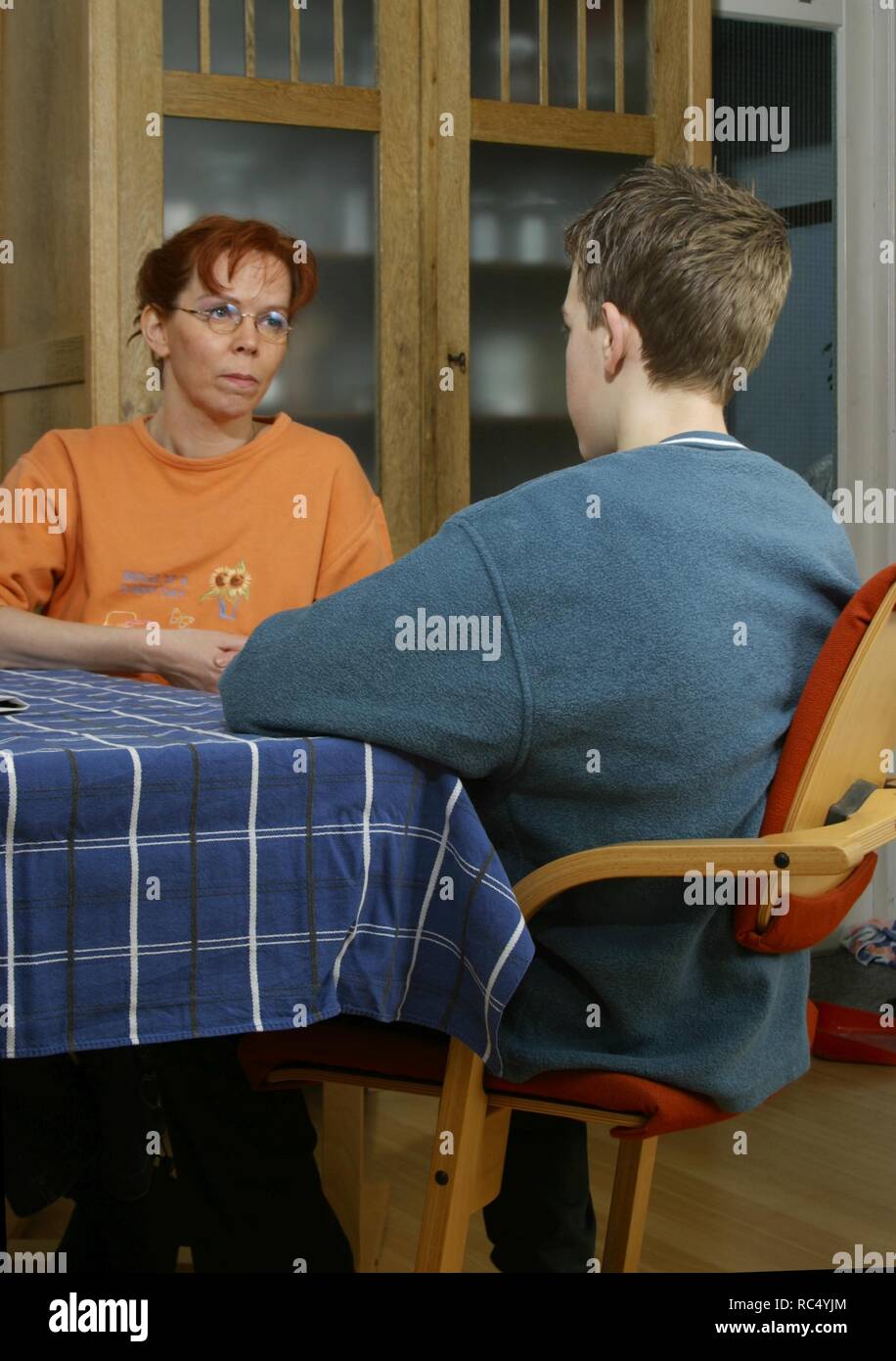 Boy and mother interview hi-res stock photography and images - Alamy