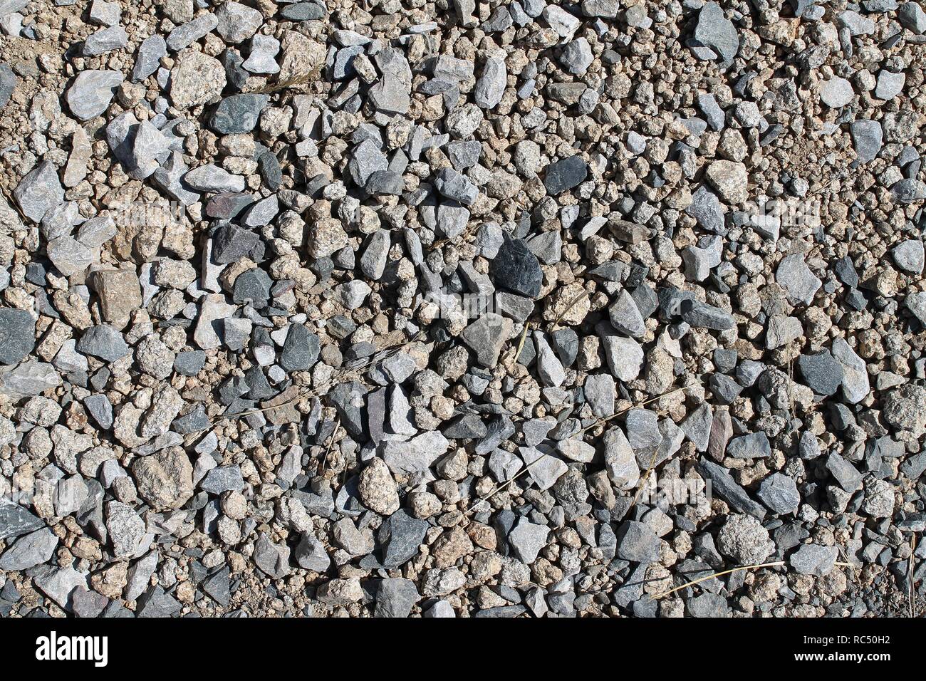 Close up high resolution surface of ground and gravel Stock Photo - Alamy
