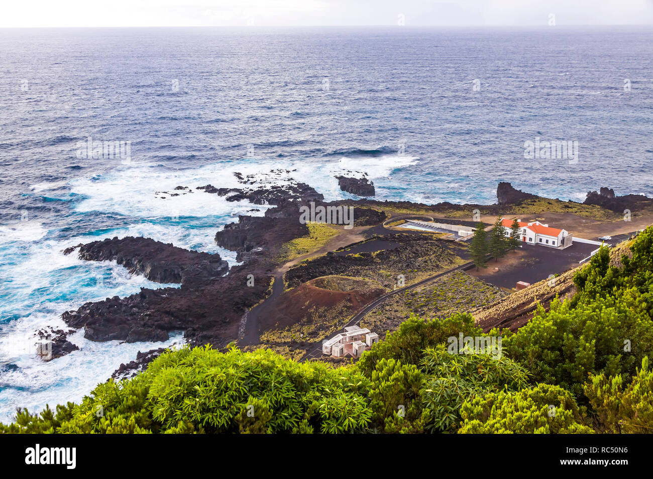 Aerial view of Ponta da Ferraria hot springs and Atlantic ocean coast ...