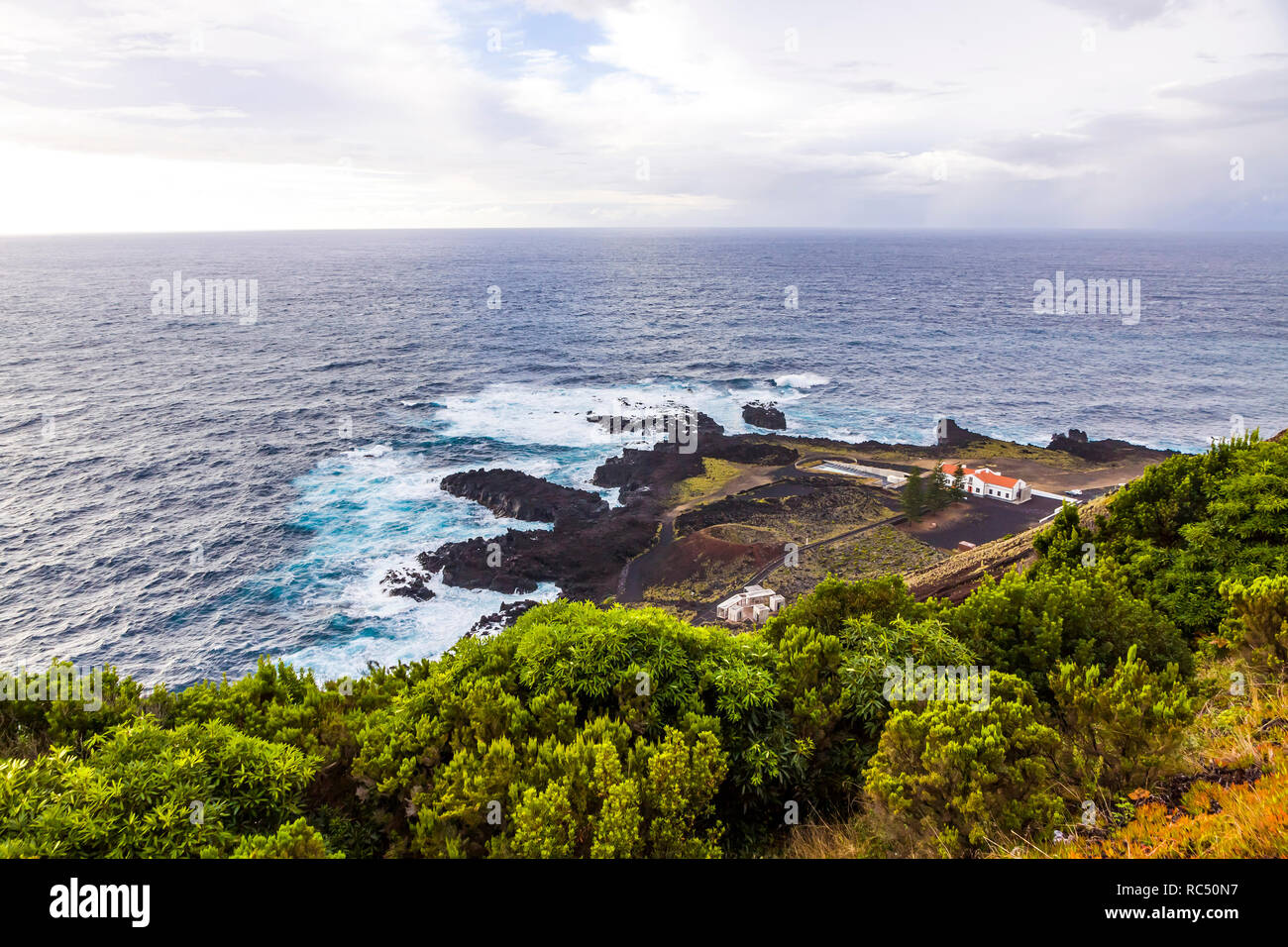 Aerial view of Ponta da Ferraria hot springs and Atlantic ocean coast ...