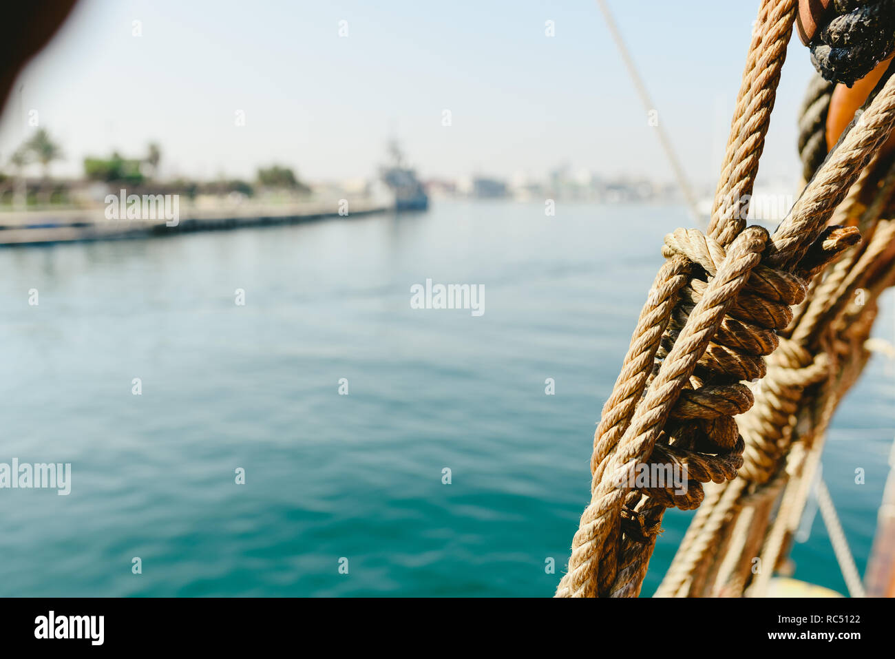 Rigging and ropes on an old sailing ship to sail in summer Stock Photo ...