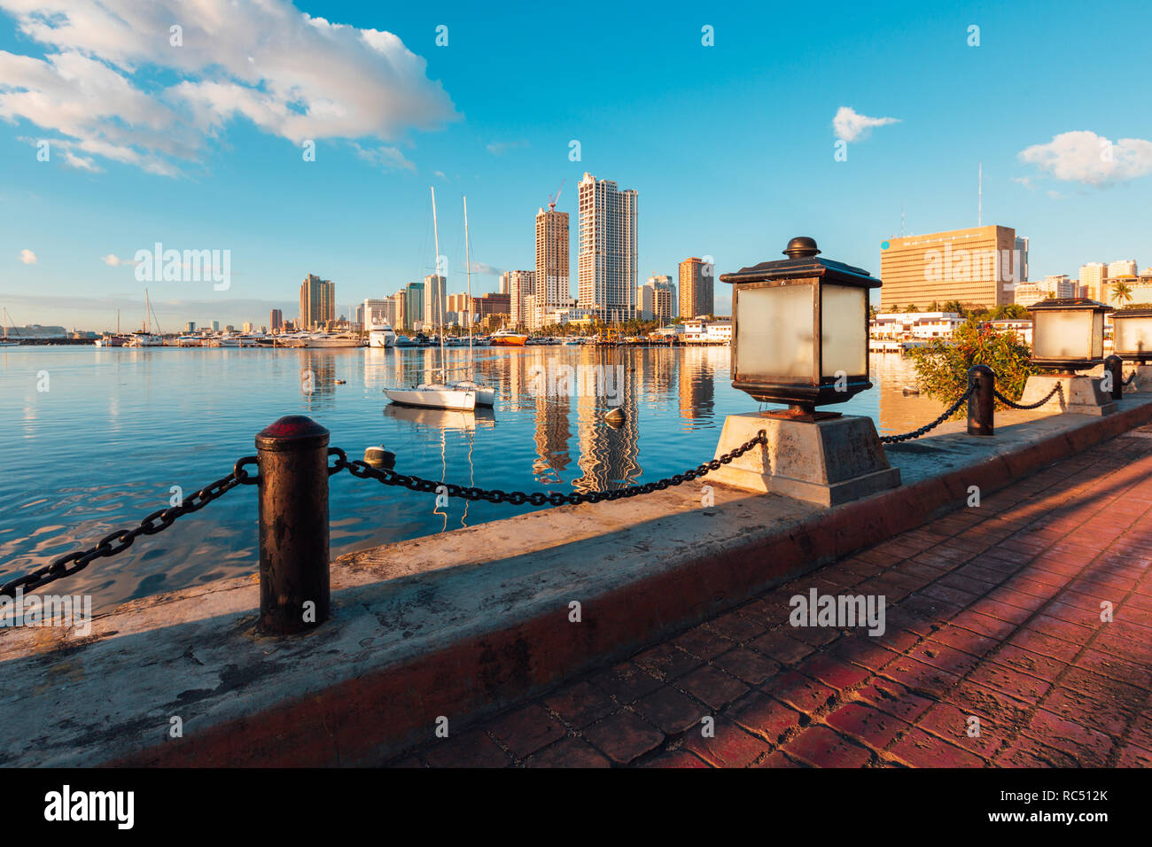 Skyline of Manila City and Manila Bay along the harbour Stock Photo - Alamy