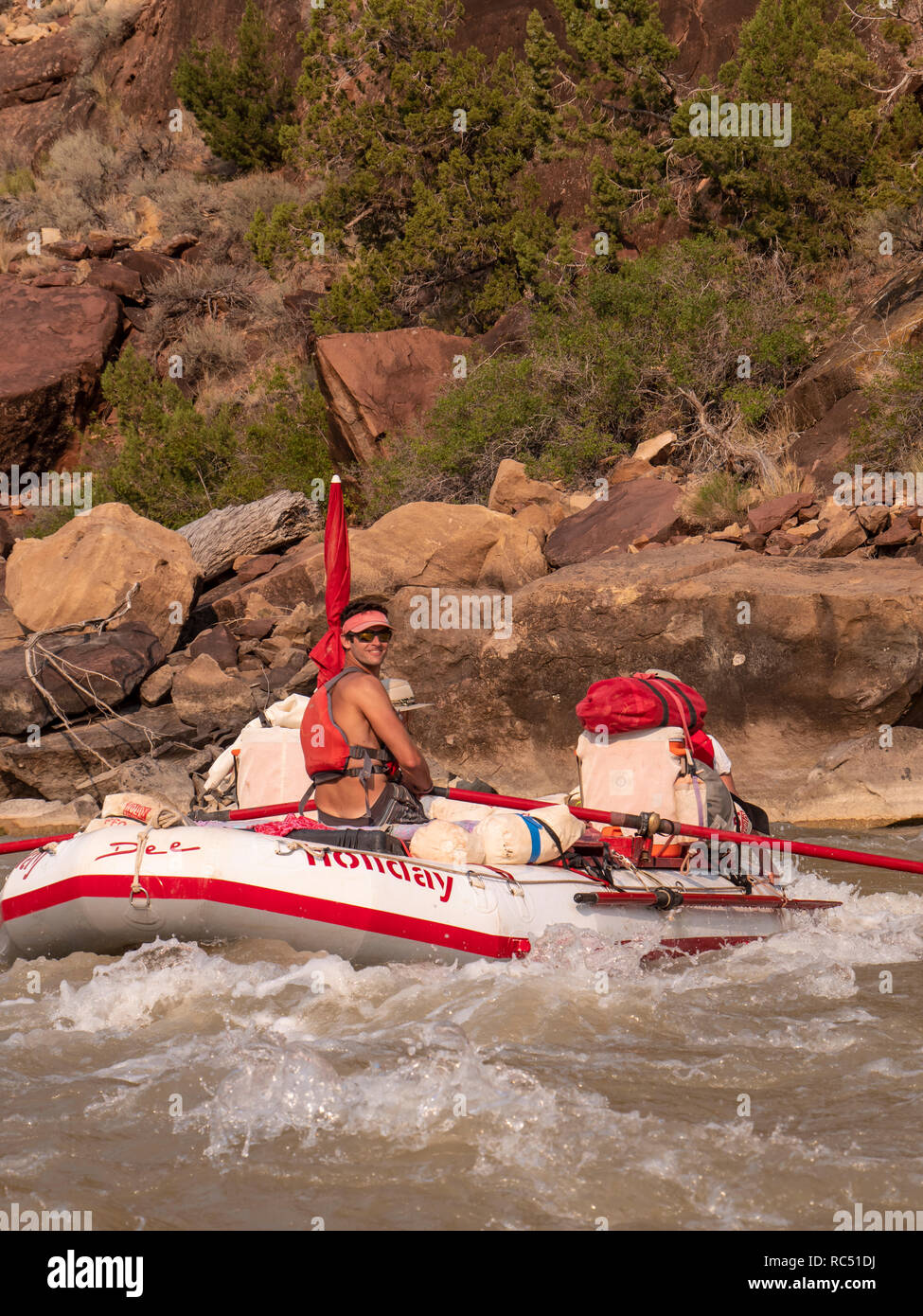 Floating the river through Steer Ridge Rapid, upper Desolation Canyon ...