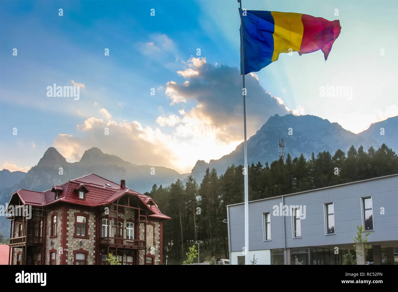 National flag of Romania flying high Stock Photo - Alamy