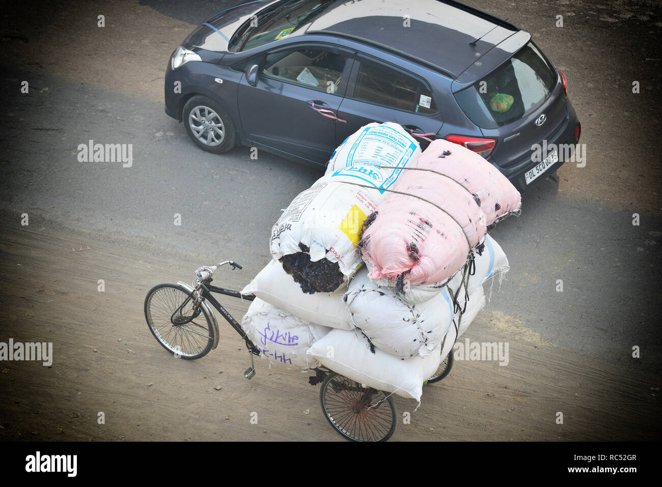 Heavy loaded rickshaw hi-res stock photography and images - Alamy