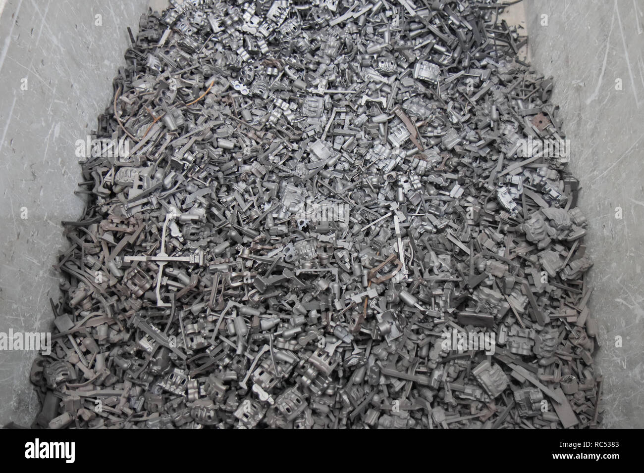 Scrap iron that is placed. Rolling back the new melting Stock Photo - Alamy